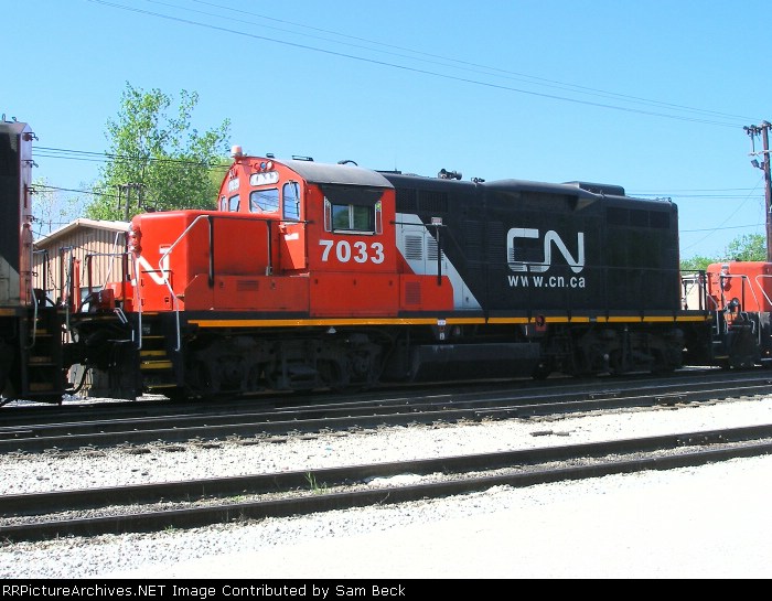 CN 7033